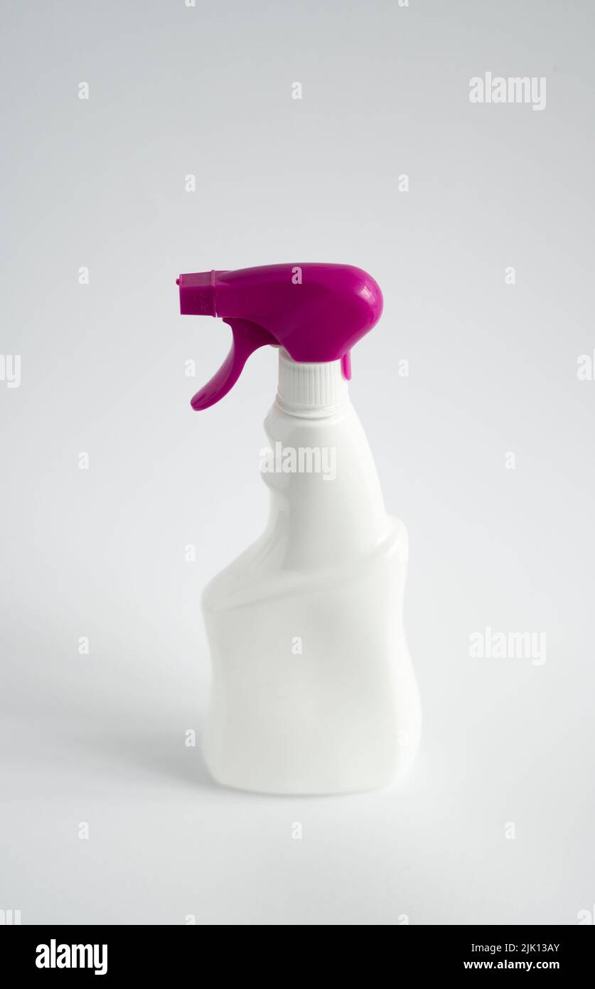 White plastic spray bottle for liquid cleaning products isolated on ...