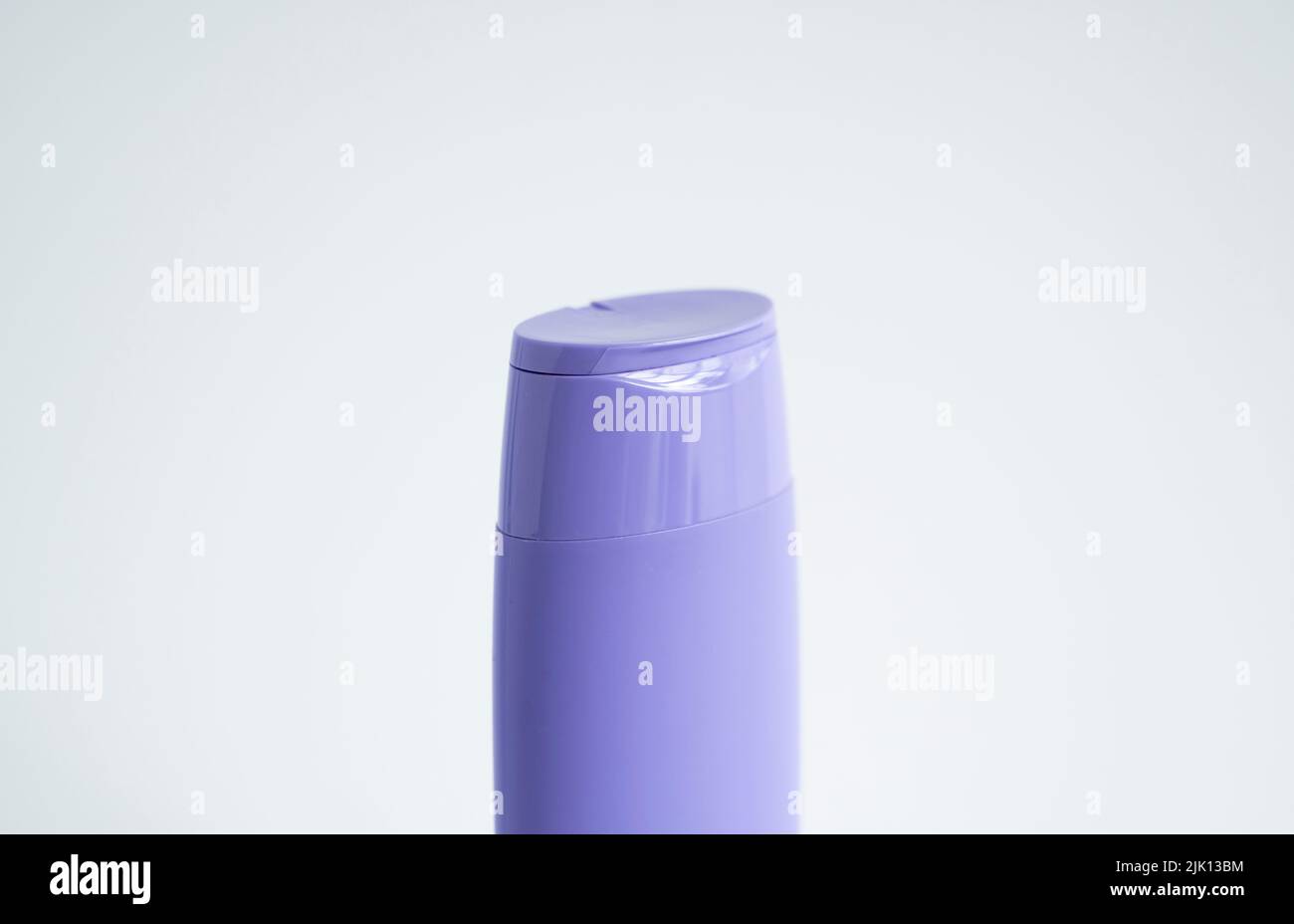 Violet plastic bottle of body care and beauty products. Studio ...