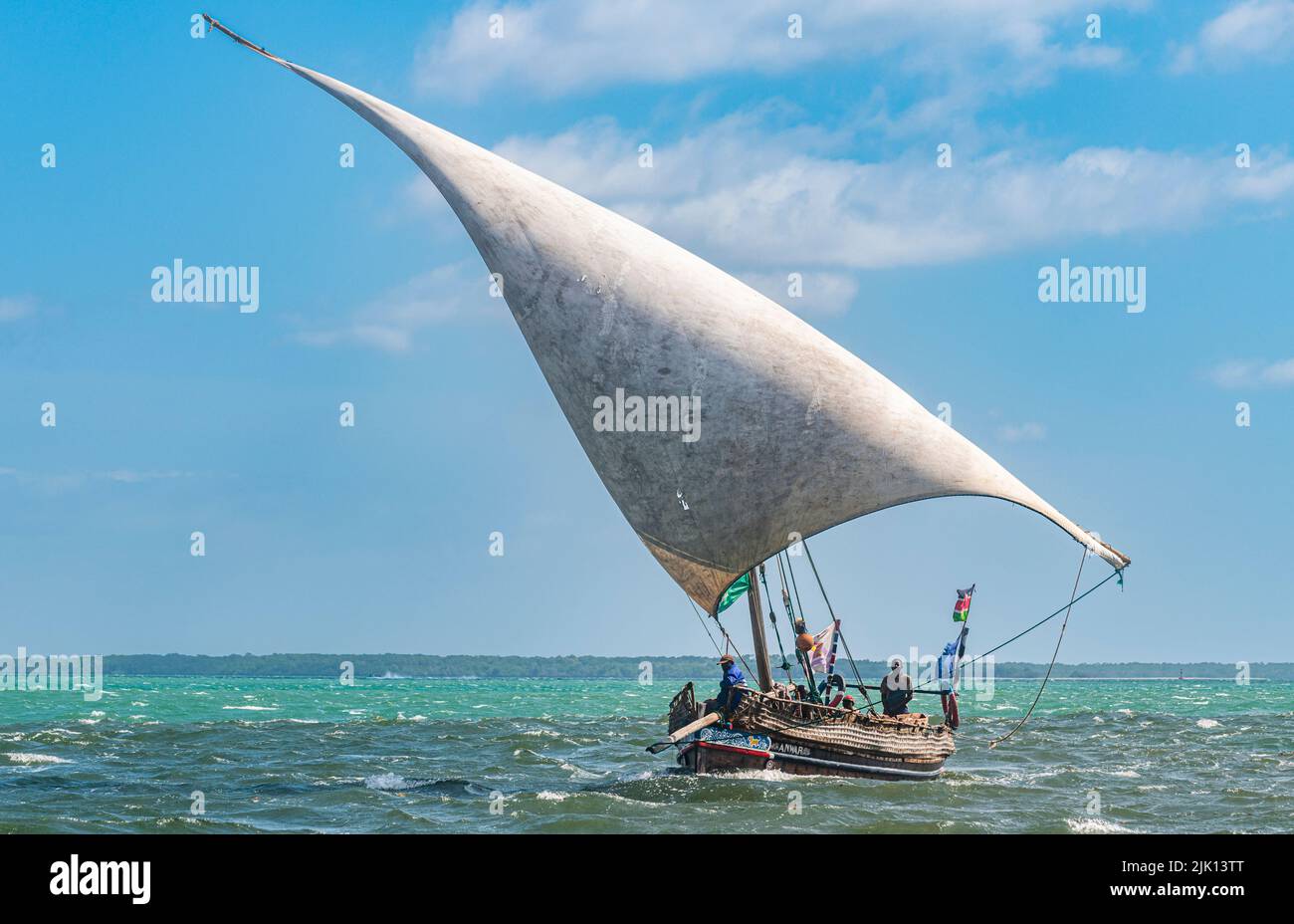 Traditional dhow sailing in the Indian Ocean, island of Lamu, Kenya ...