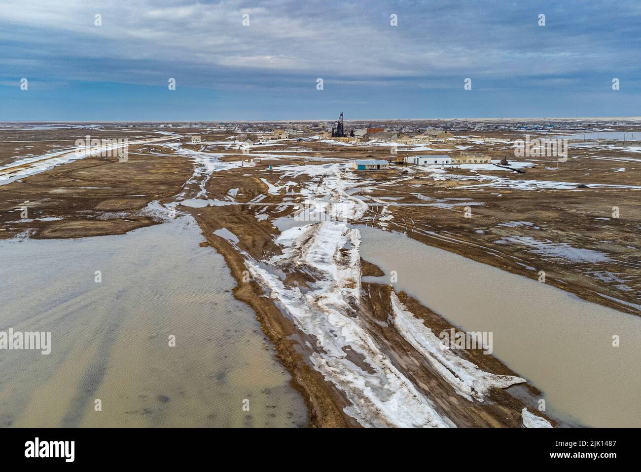 Aerial of an old wheat farm in the semi frozen earth, South of Kostanay ...