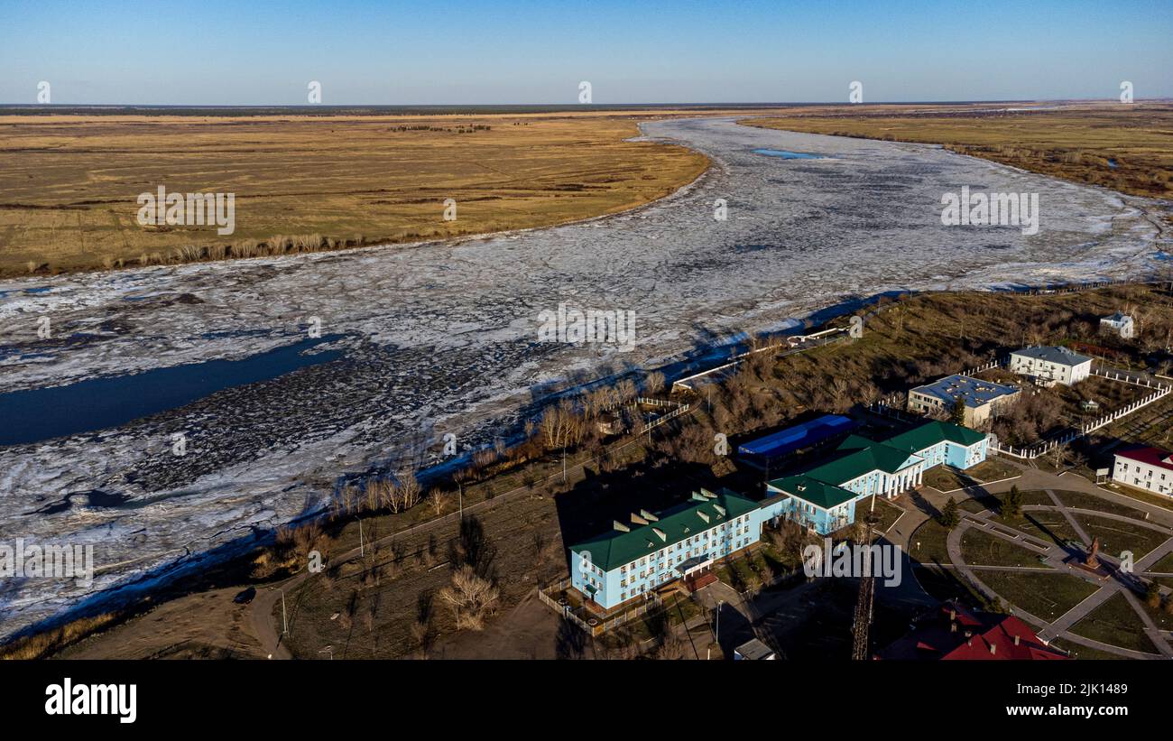 Aerial of Irtysh river, Kurchatov, fomer headquarters of the ...
