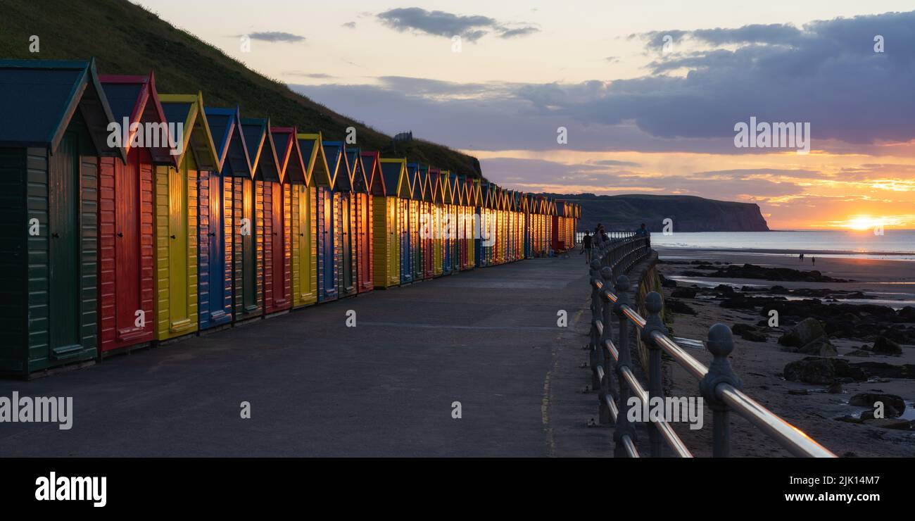 Beach huts at sunset, Whitby, North Yorkshire, England, United Kingdom ...