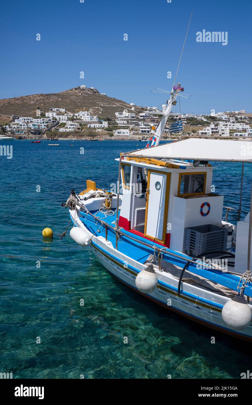 Traditional fishing boat moored in the harbour at Ornos Beach, Mykonos ...