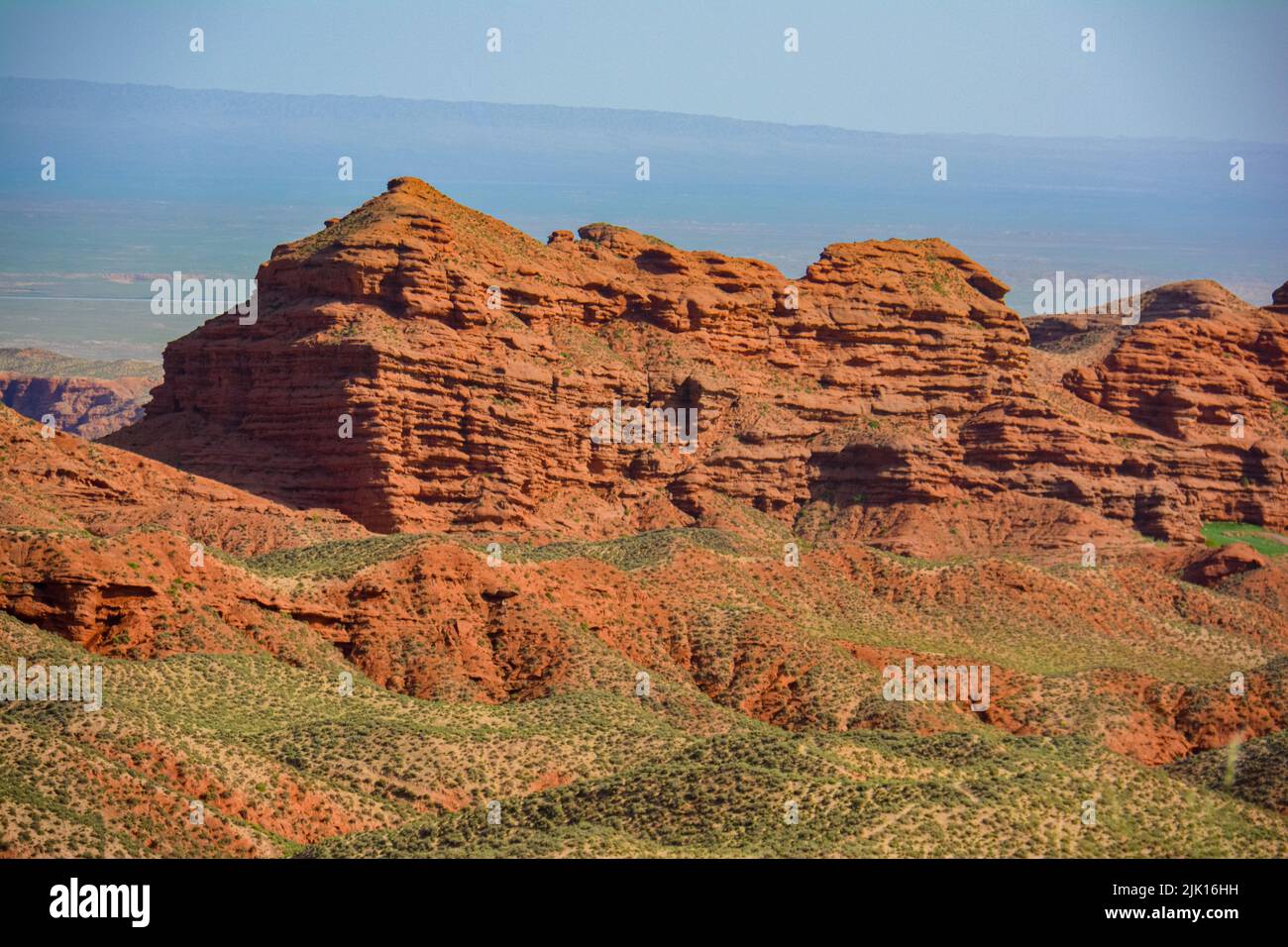 A mesmerizing scene of red cliffs desert under blue sky Stock Photo - Alamy