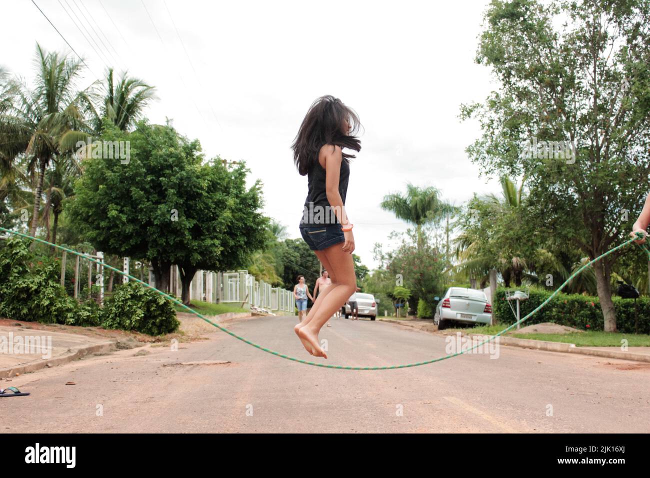 Kids jumping rope hi-res stock photography and images - Alamy