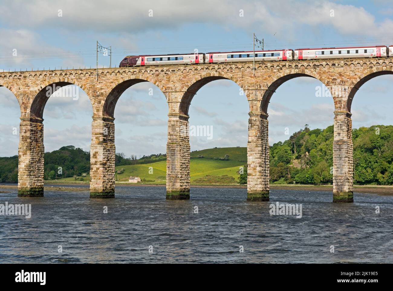 Royal Border Bridge with intercity railway train over the river Tweed ...