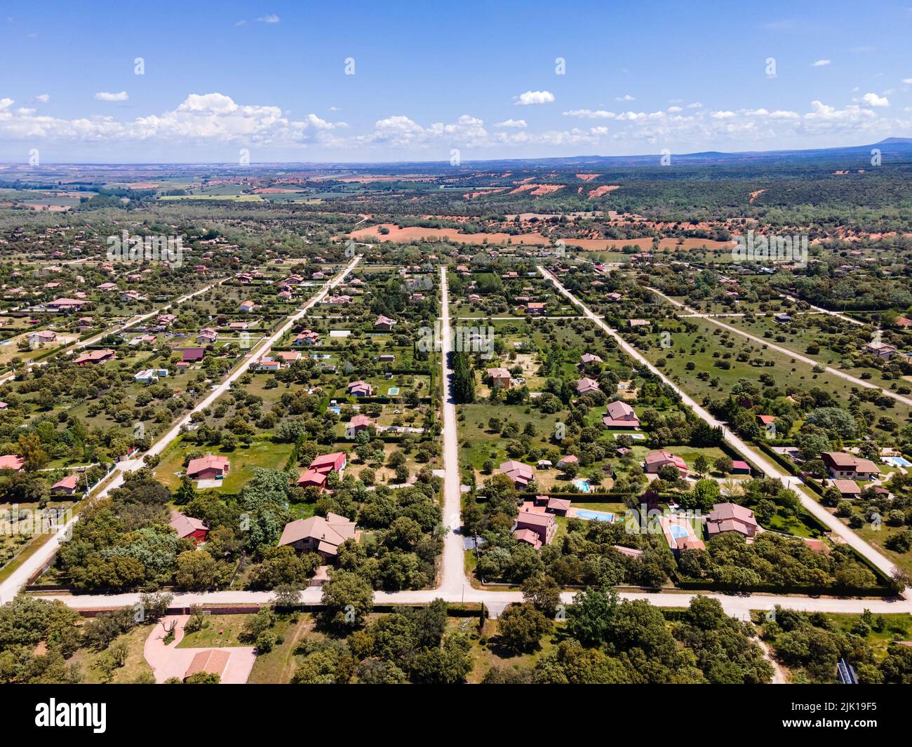 aerial view of an urbanization of country houses with symmetrical ...