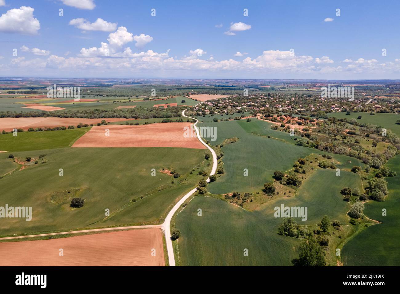 Aerial view of a Castilian countryside with country houses and plots of ...