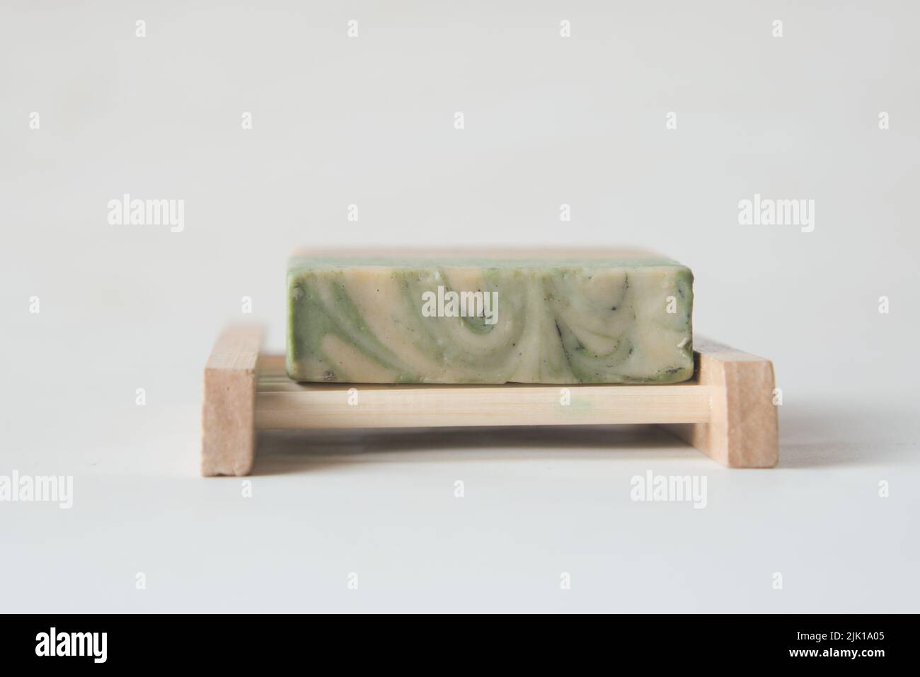Homemade natural soap bar on black background Stock Photo - Alamy