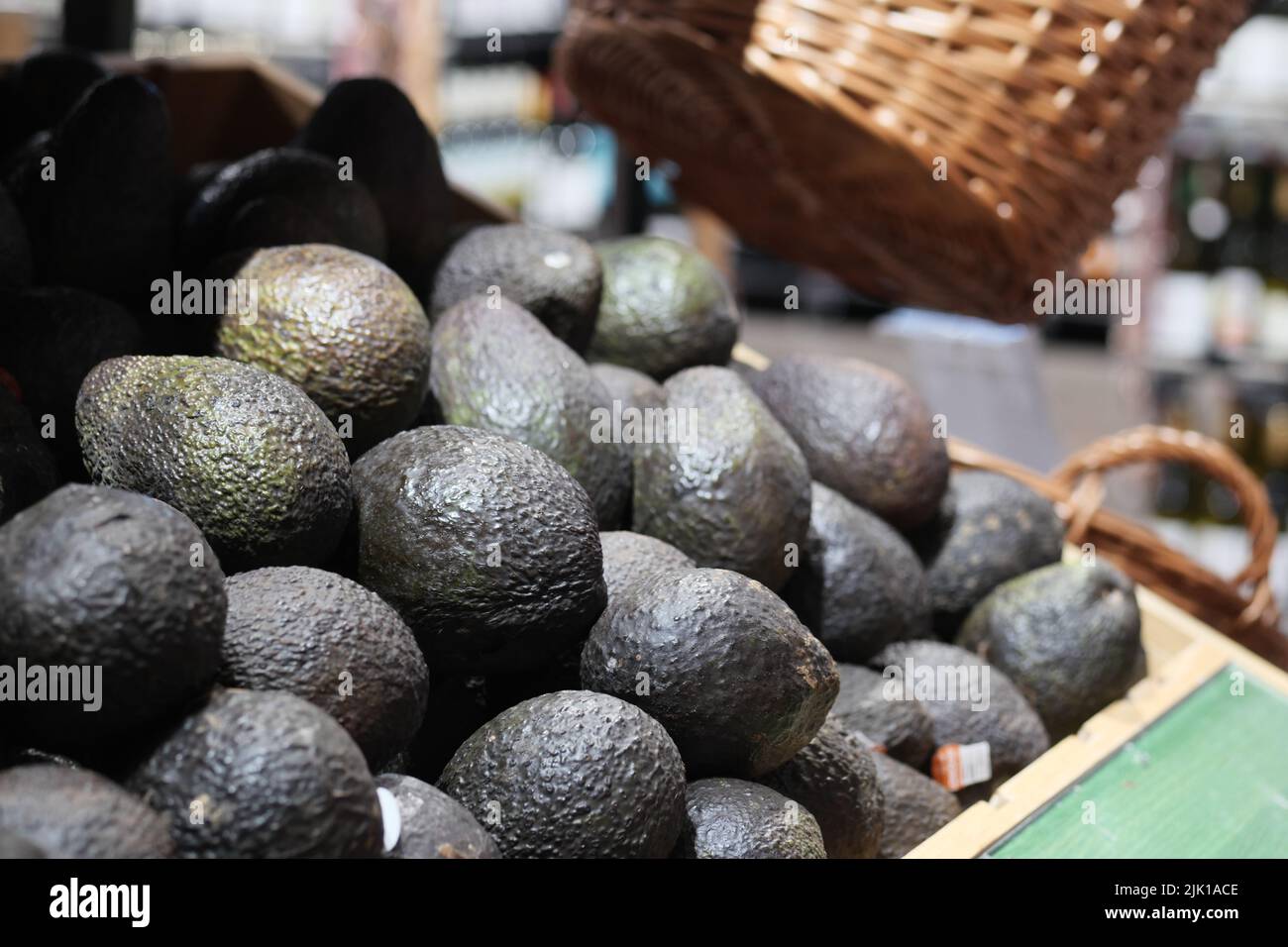 many avocado display for sale at local store Stock Photo - Alamy
