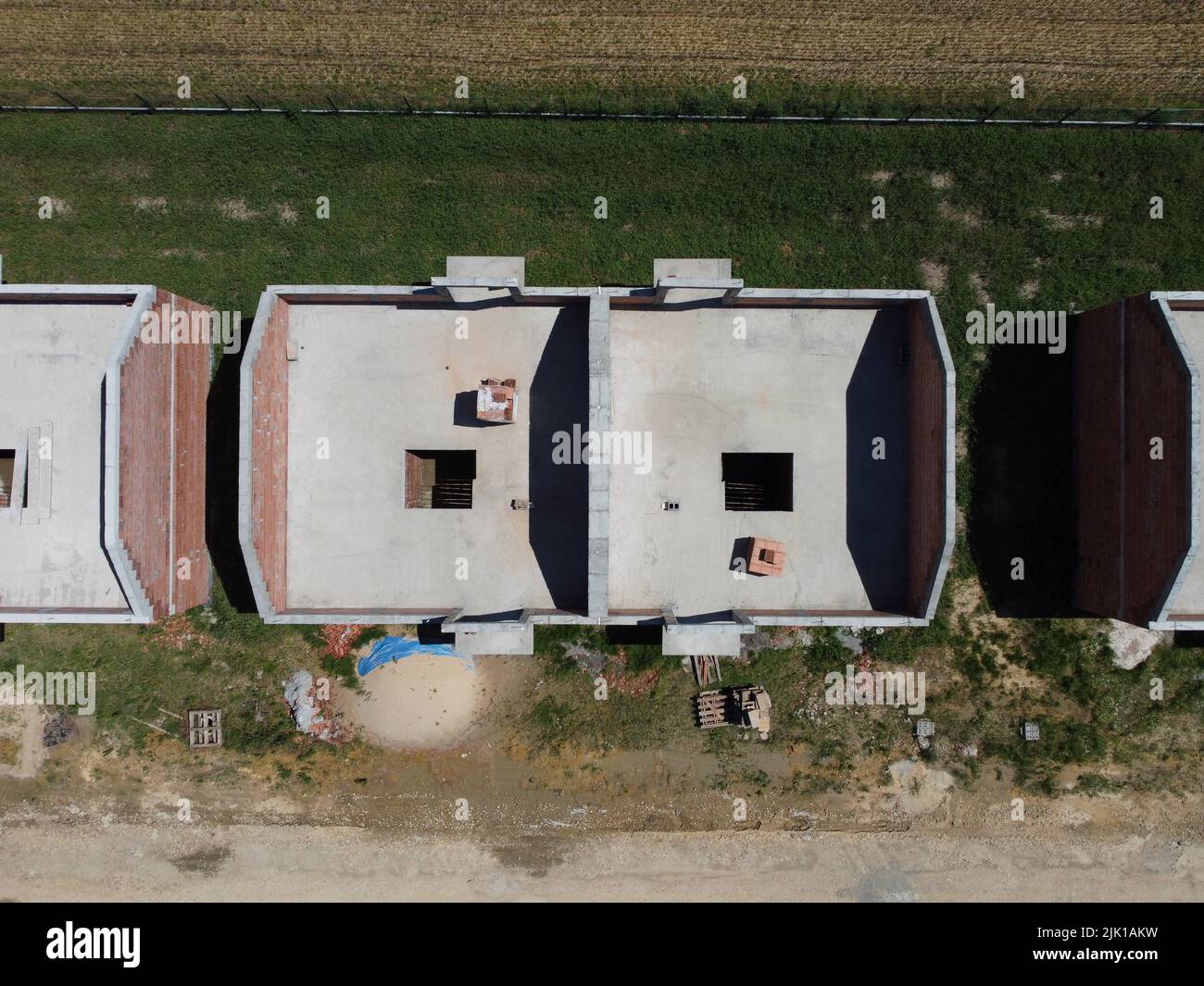 An aerial view of construction site roof top on rural grass area Stock ...