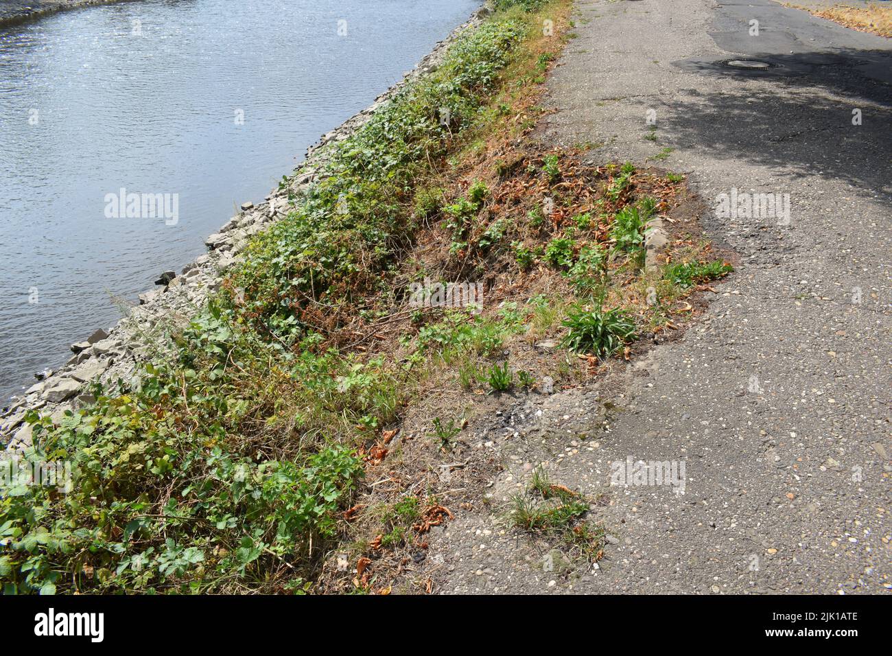bad hole in the street Stock Photo - Alamy