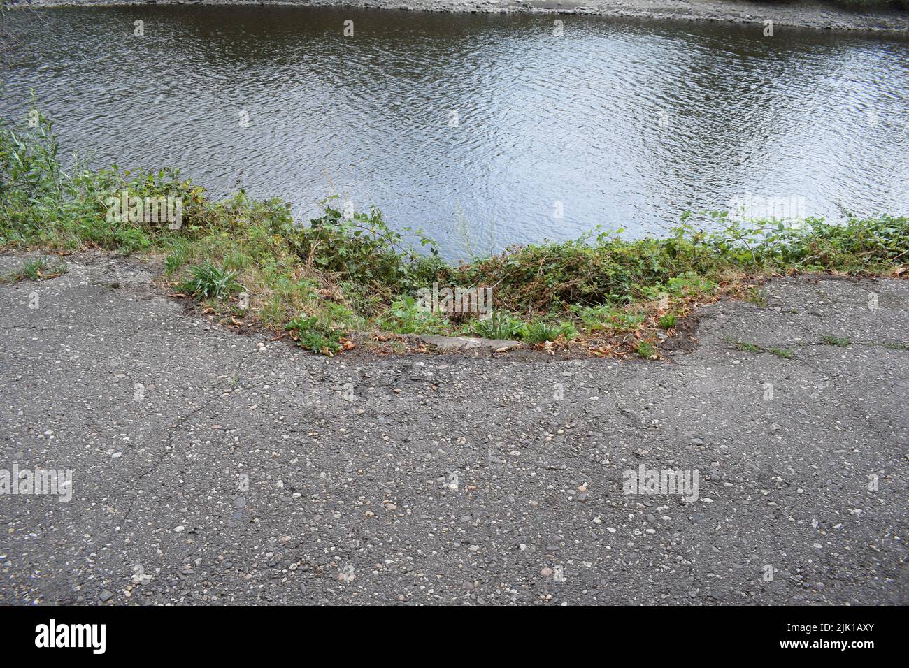 bad hole in the street Stock Photo - Alamy