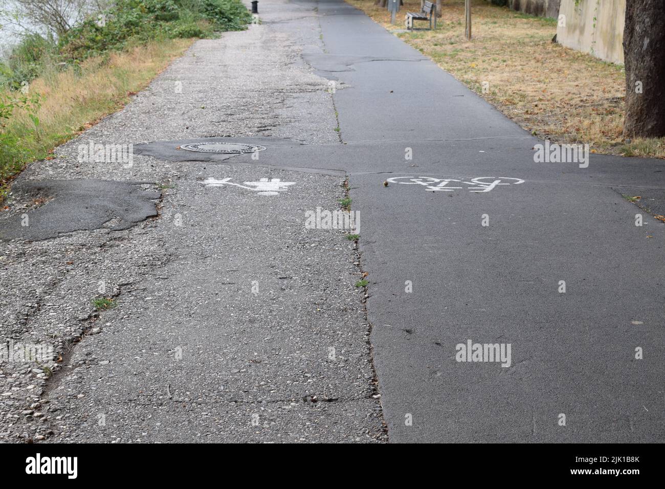 bike road and pedestrian lane, both deteriorated Stock Photo - Alamy