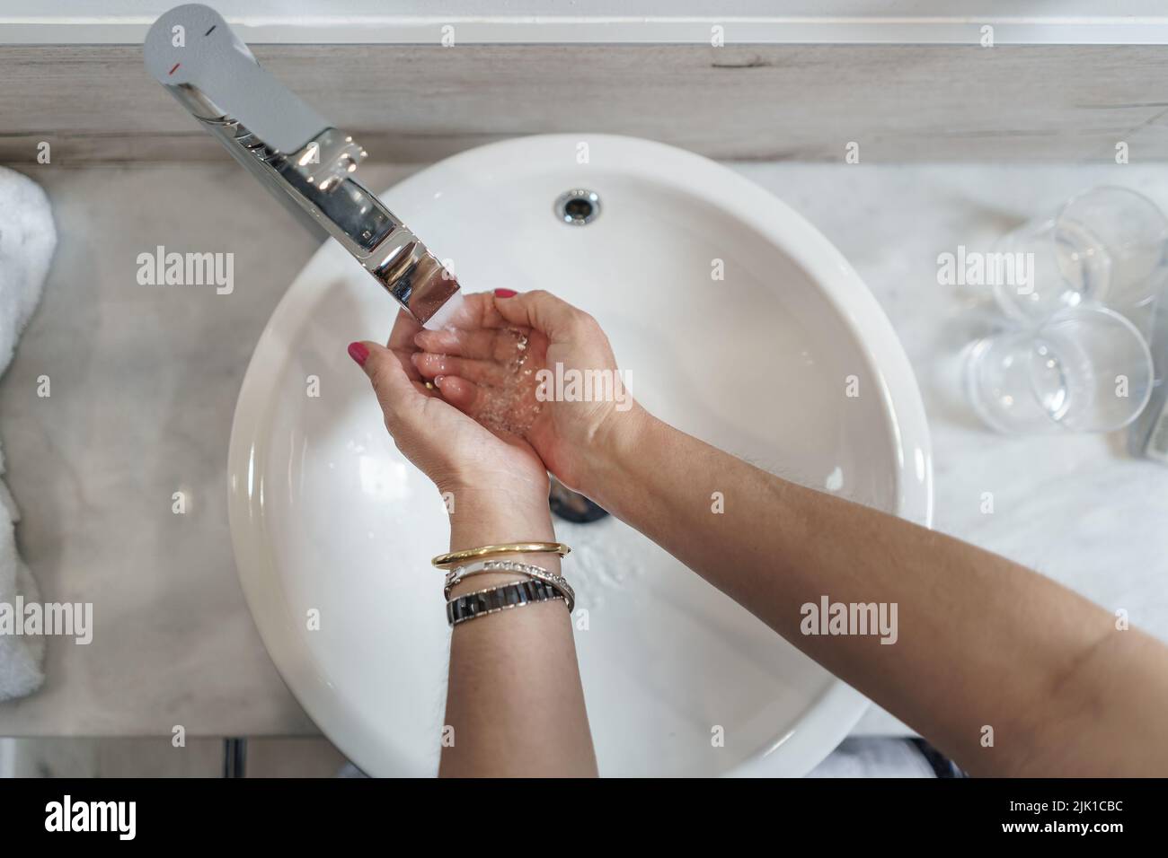 Girl washing hands basin hi-res stock photography and images - Alamy