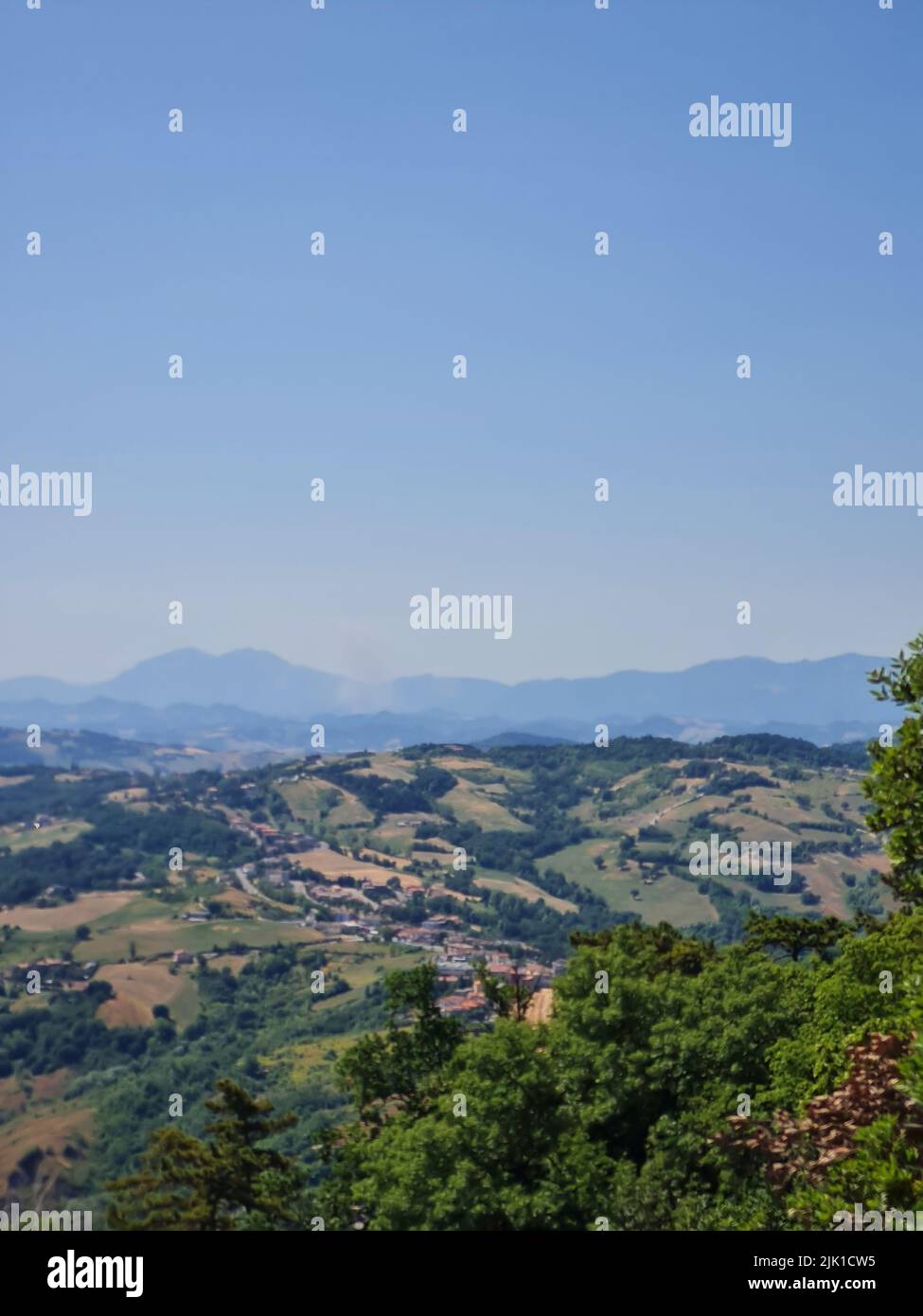 A beautiful view from a high point of a green landscape with cliffs ...
