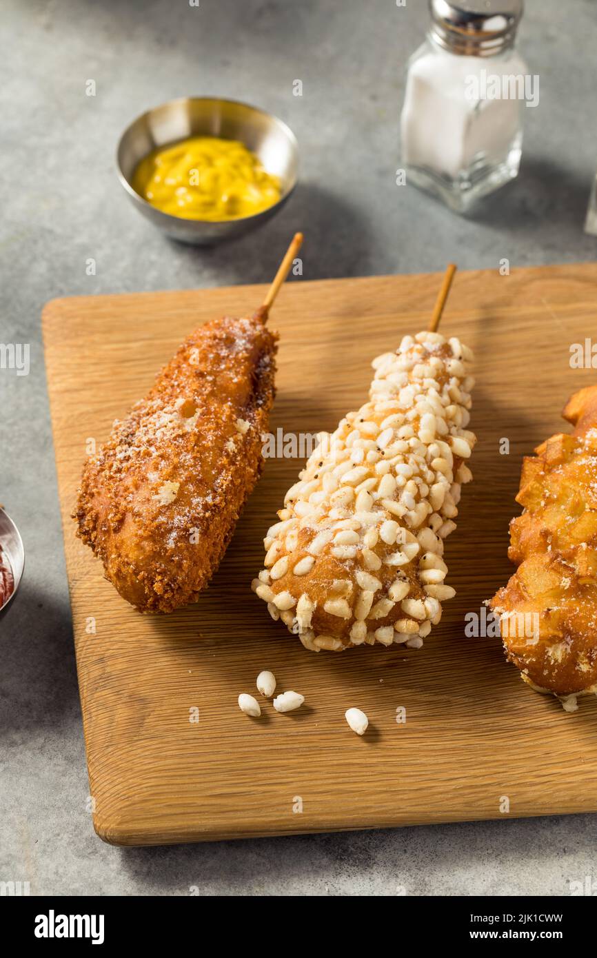 Homemade Fried Korean Corn Dog with Potatoes and Rice Toppings Stock ...