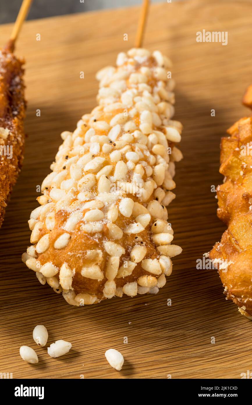Homemade Fried Korean Corn Dog with Potatoes and Rice Toppings Stock ...