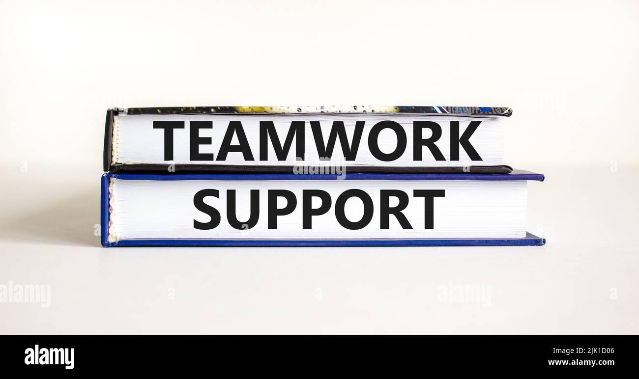 Teamwork support symbol. Concept words Teamwork support on books on a ...