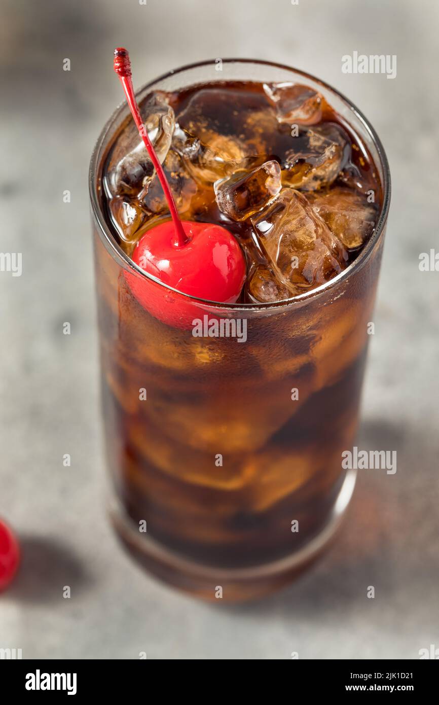 Cold Refreshing Cherry Cola Soda with a Straw Stock Photo - Alamy