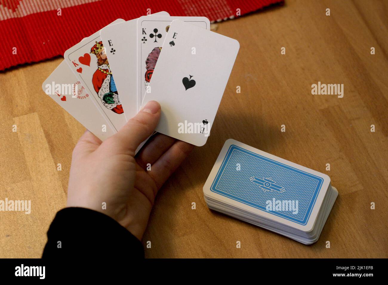Someone who plays cards Stock Photo - Alamy