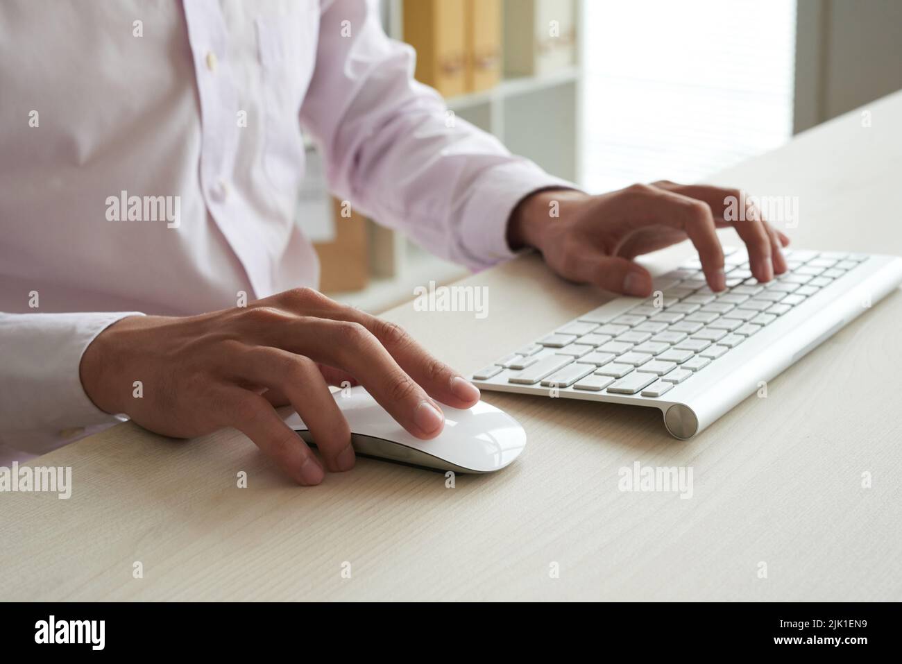 Hands of business executive working on computer Stock Photo - Alamy