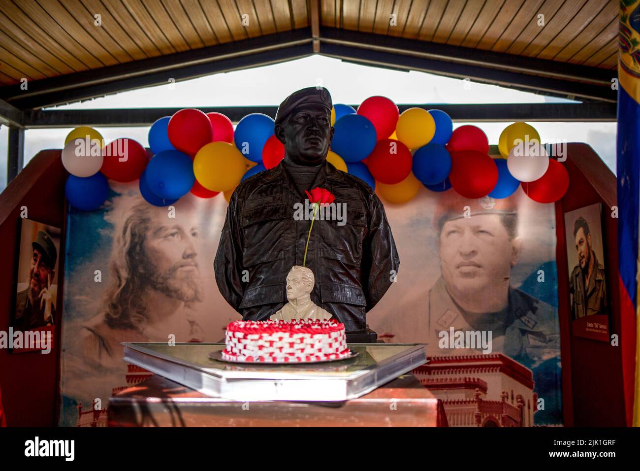 Caracas, Venezuela. 28th July, 2022. A cake stands in front of a statue ...
