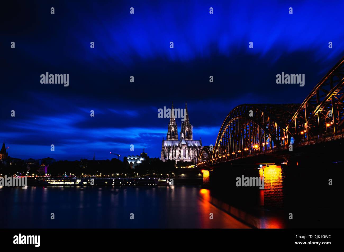 A scenic view of the Cologne Cathedral at night in Germany Stock Photo ...