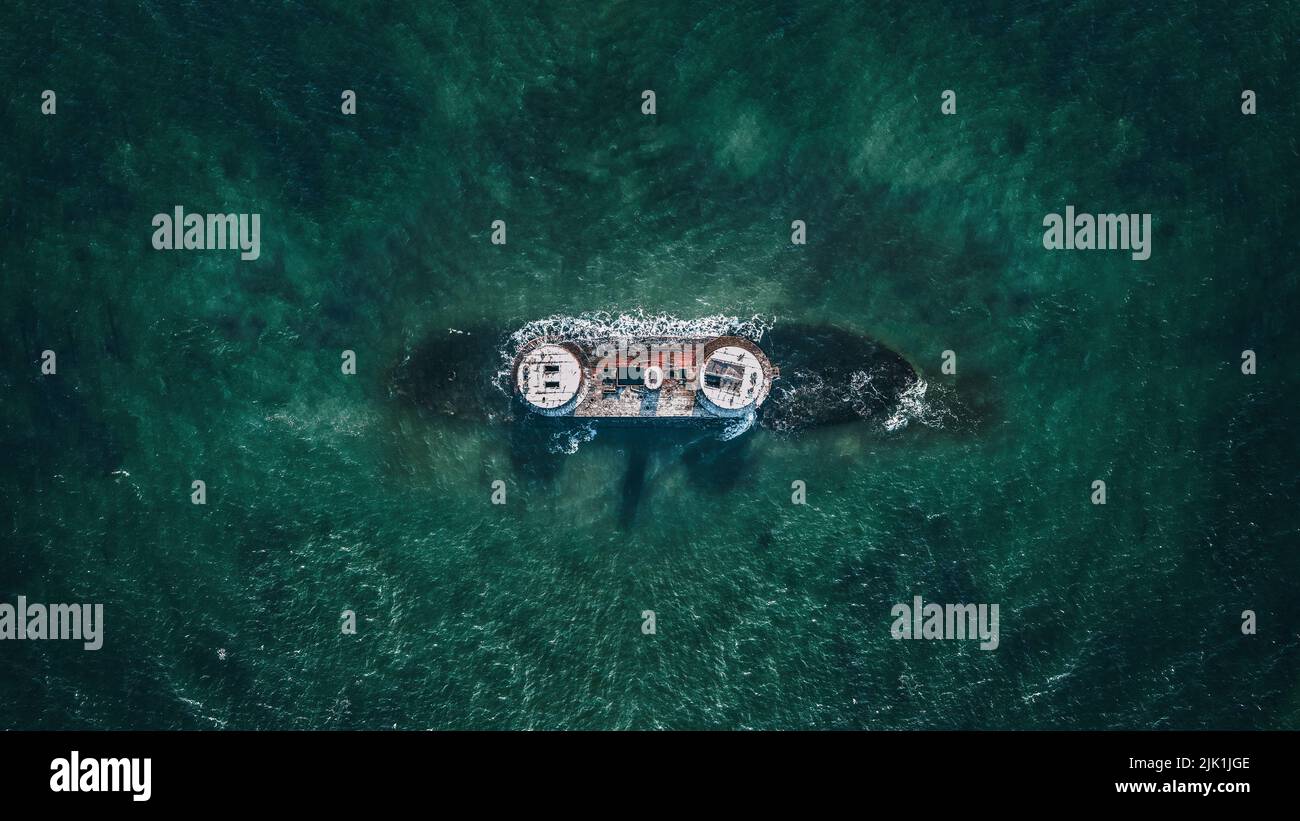An aerial view of a sea with a submarine in the center Stock Photo - Alamy