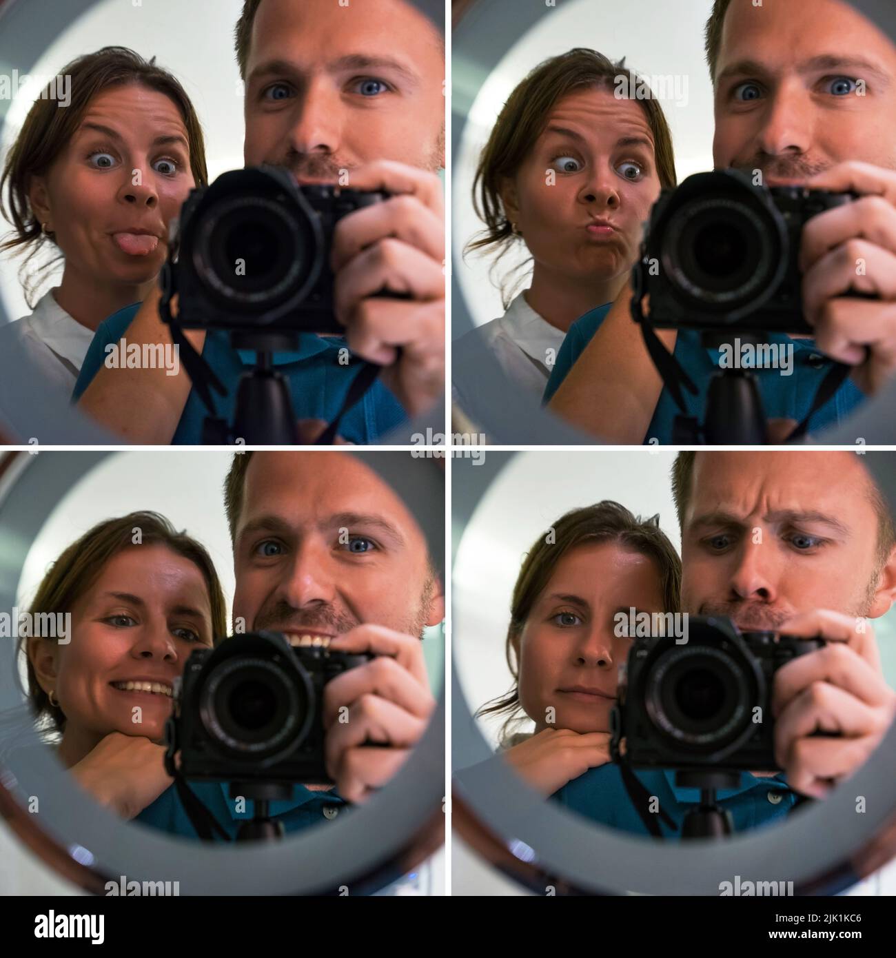 Couple making photo for memory in mirror Stock Photo - Alamy