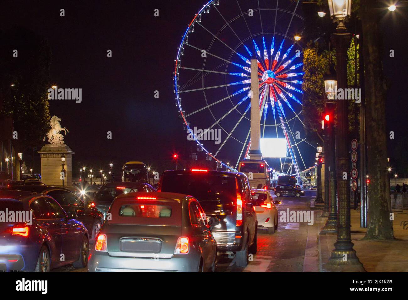 Amazing View on Champ Elysees street with lights of cars in night and ...
