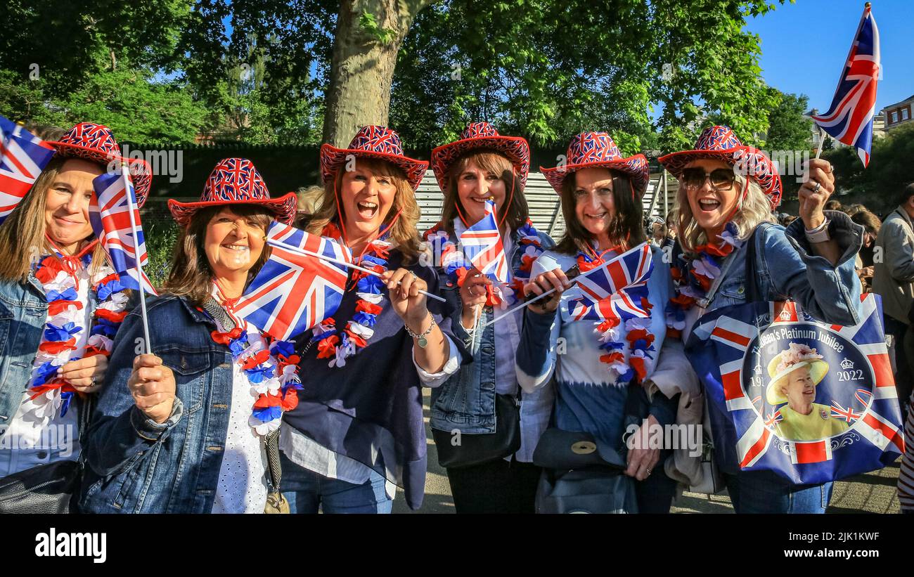 A group of Royal fan women with Union Jack outfits and flags, Platinum ...