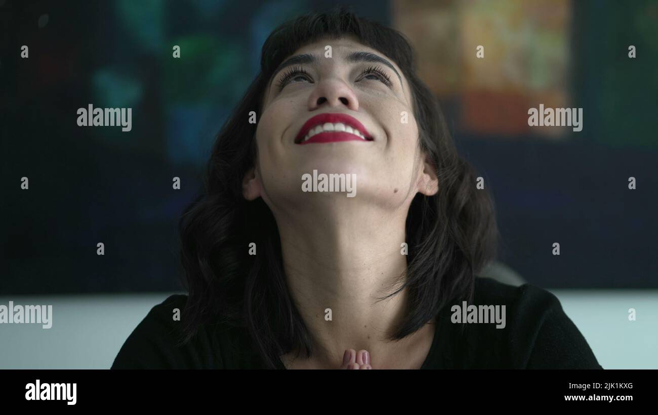 Hopeful person celebrating success. Grateful young woman having HOPE ...