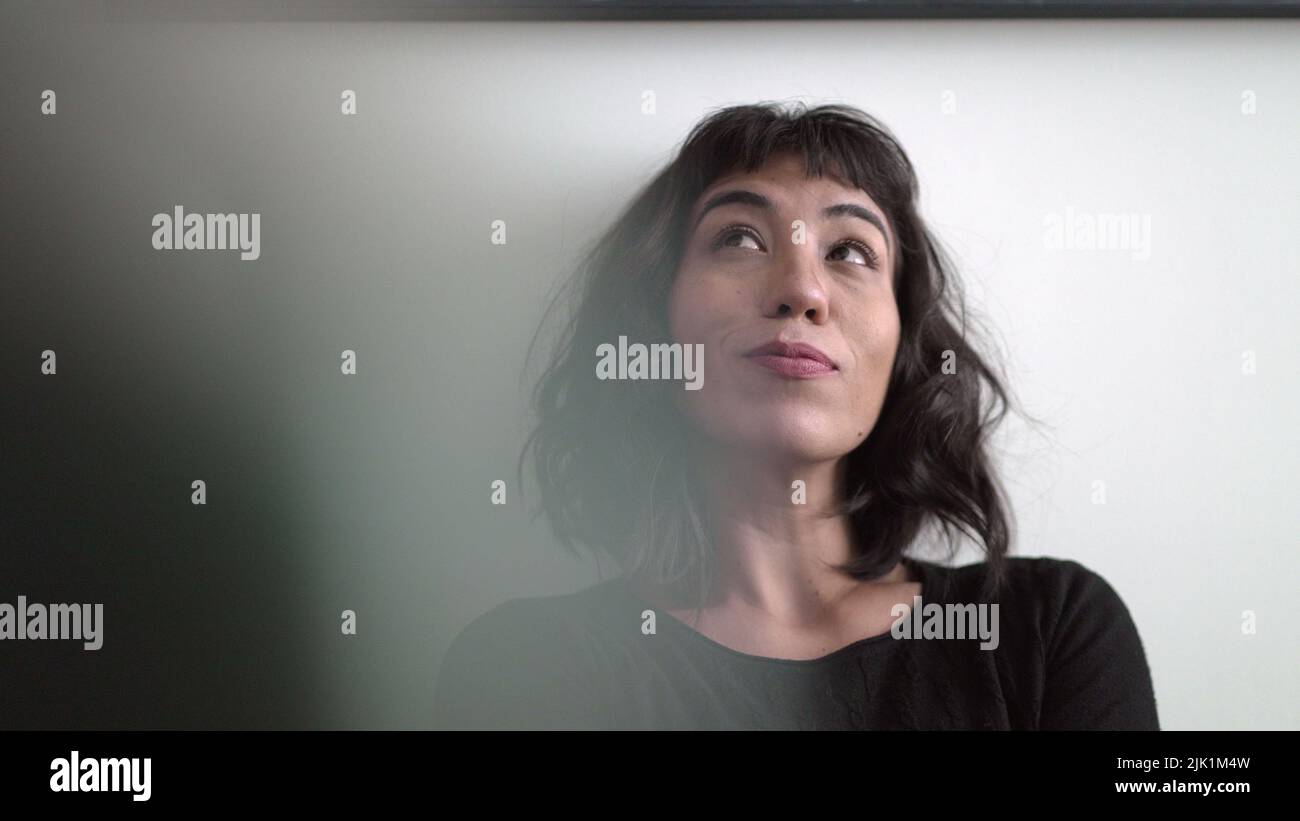 Inspired young woman positive emotion expression. Person thinking of ...