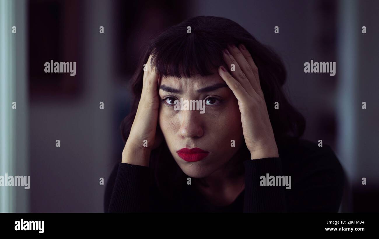 Young woman suffering alone with negative emotion closeup face. Girl in ...