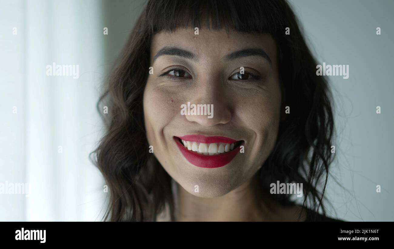 One beautiful hispanic girl portrait smiling at camera. Closeup face of ...