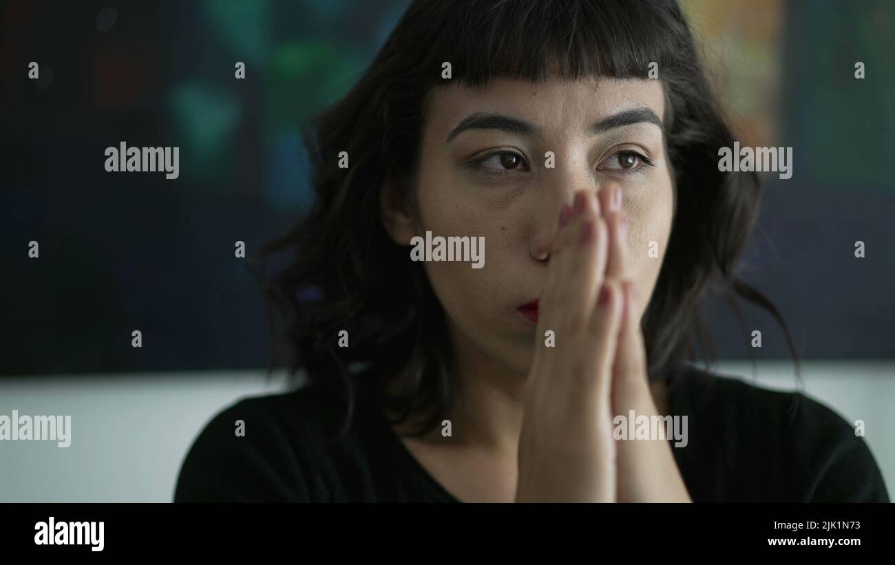 One anxious hispanic young woman closeup face. Portrait of person ...