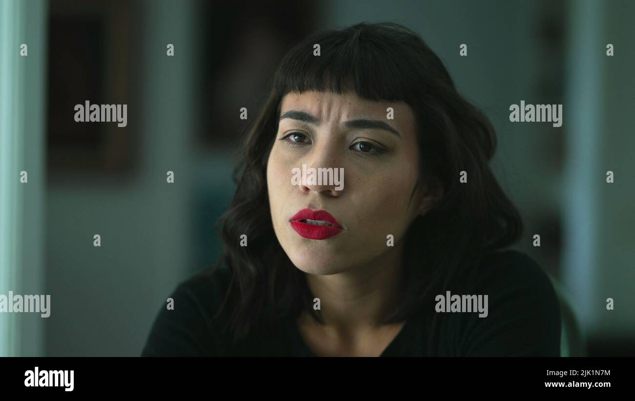 One concentrated hispanic latin girl closeup face introspective emotion ...