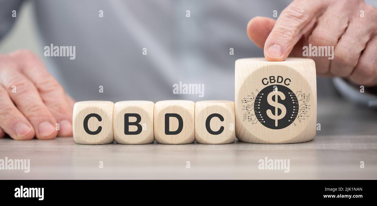 Wooden blocks with symbol of cbdc concept Stock Photo - Alamy