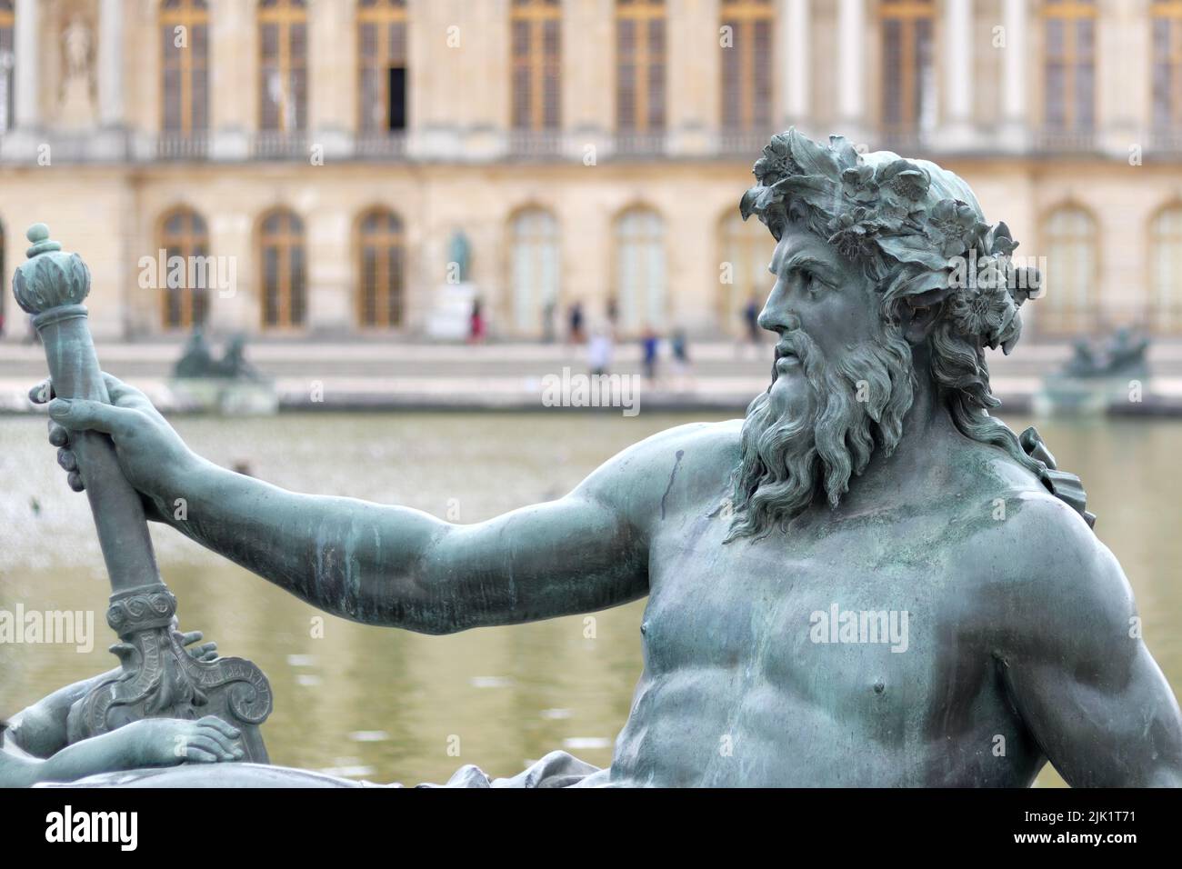 VERSAILLES / FRANCE - June 16, 2019: Bronze statues of antique gods in ...