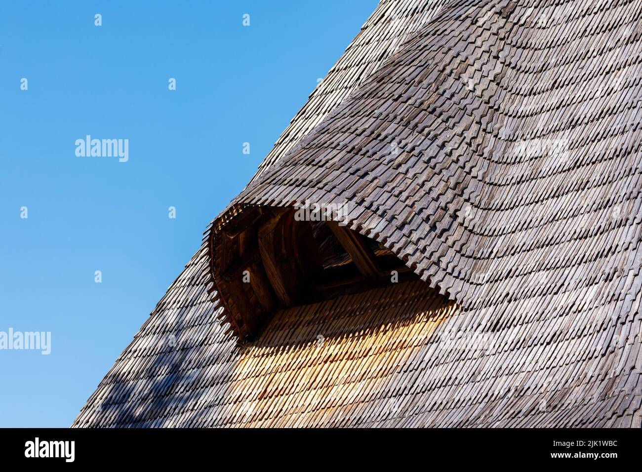 roof with wooden tiles of a house Stock Photo - Alamy
