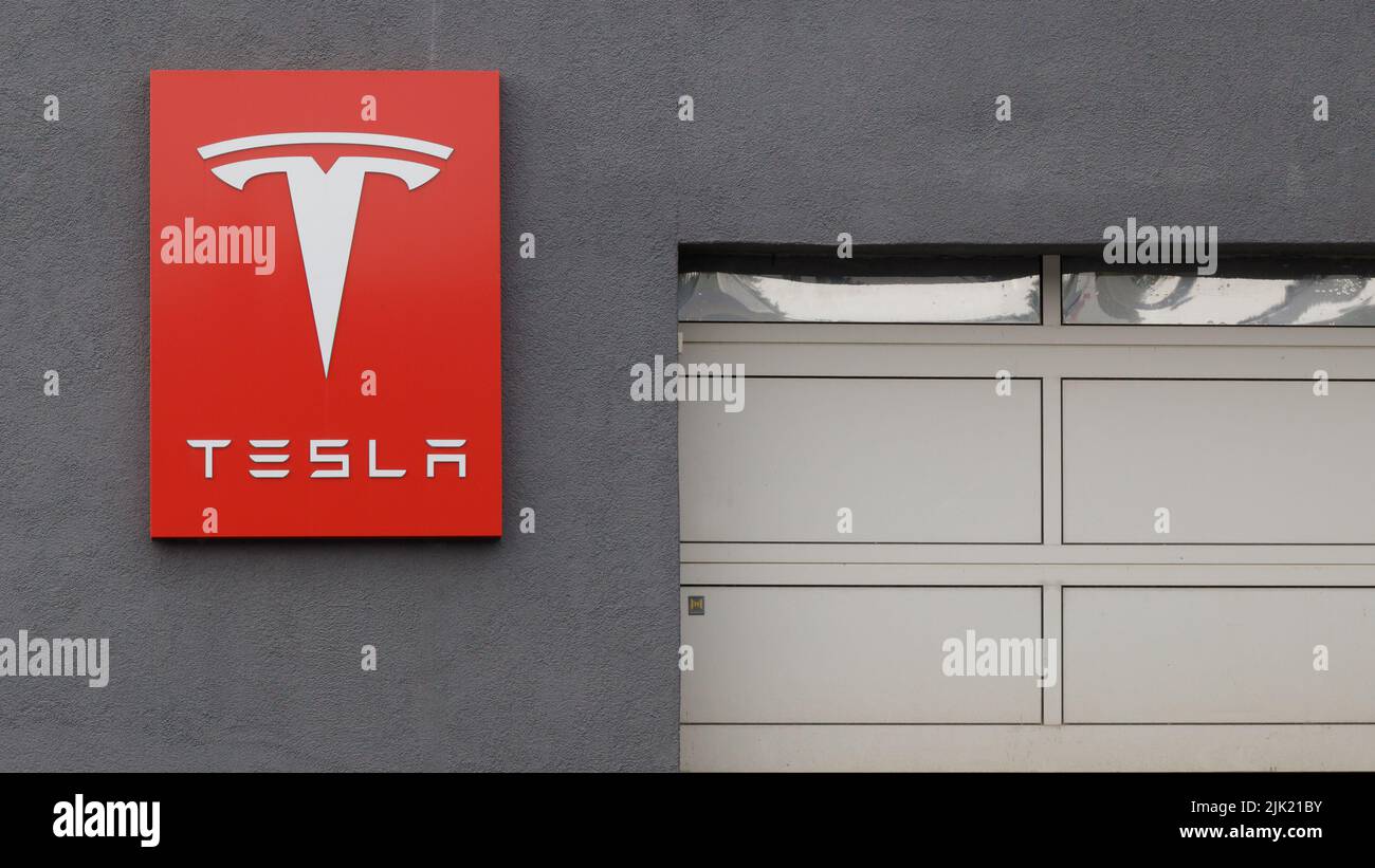 Poznan, Poland. 29 Jul 2022: TESLA logo on electric car service ...