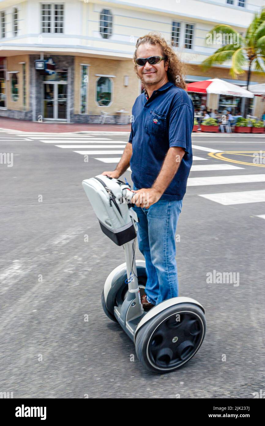 Riding using segway hi-res stock photography and images - Alamy