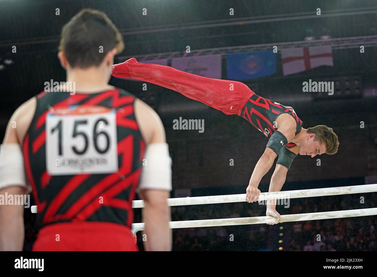Canada's Felix Dolic warms up before his parallel bars rotation of the ...