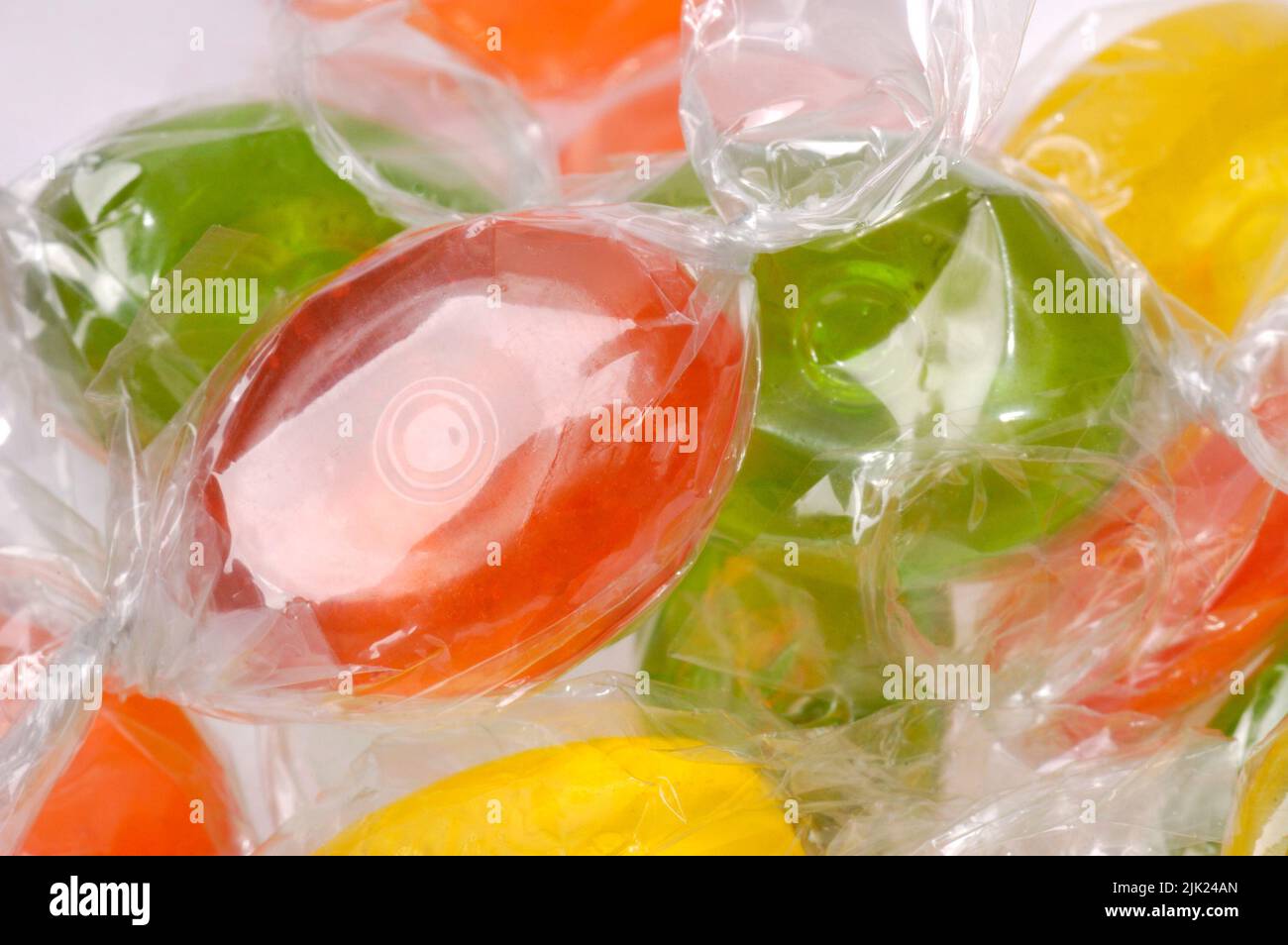 Yellow wrapped candy hi-res stock photography and images - Alamy