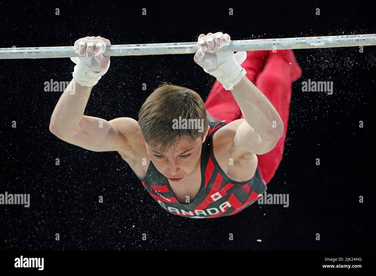 Canada's Mathys Jalbert in action during his bars rotation of the Men's Team Final and ...