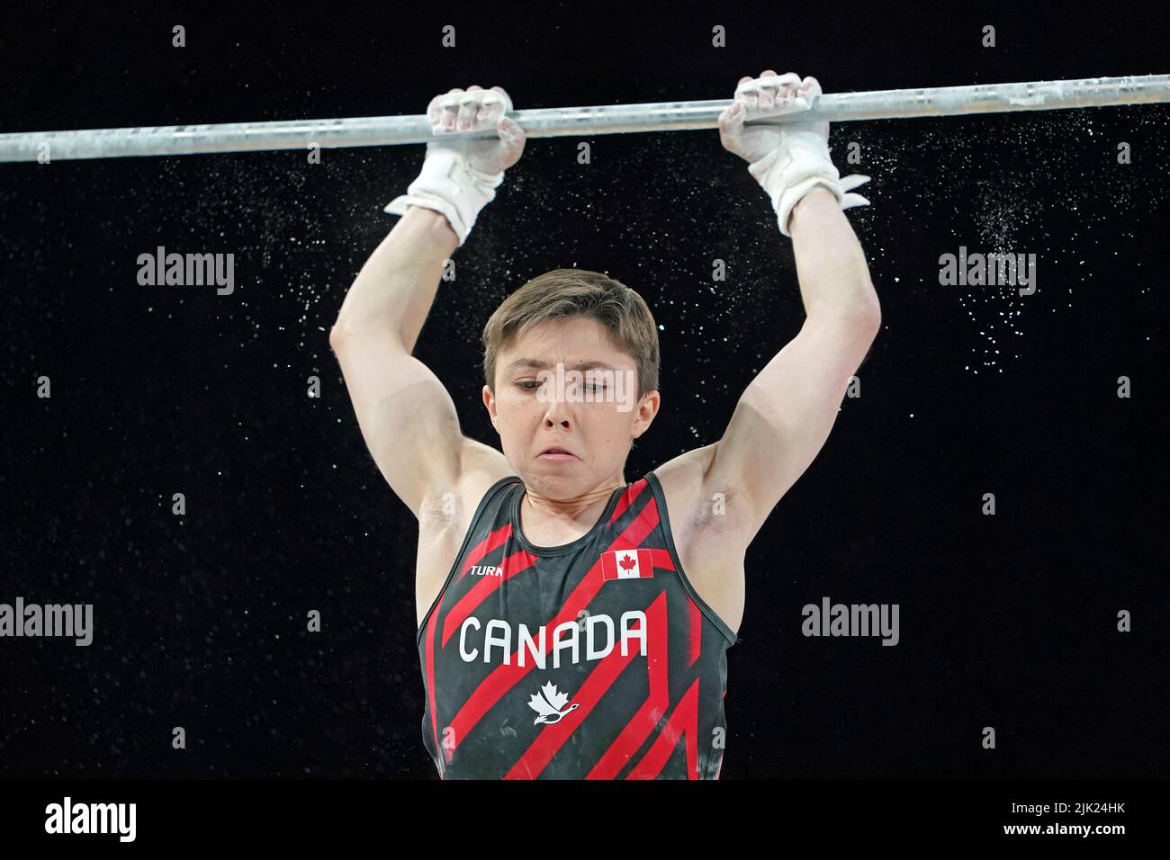 Canada's Mathys Jalbert in action during his bars rotation of the Men's Team Final and ...