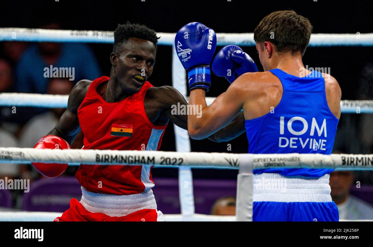 Ghana's Abdul Wahib Omar (Left) and Isle of Man's Jamie Devine during the Men’s Over 60kg-63.5kg ...