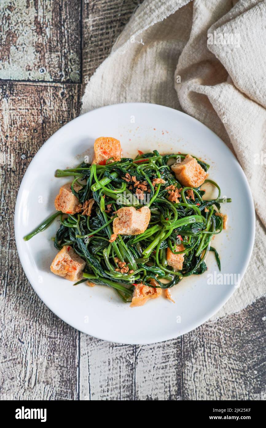 Tumis kangkung tahu : is stir fried water spinach or morning glory with ...