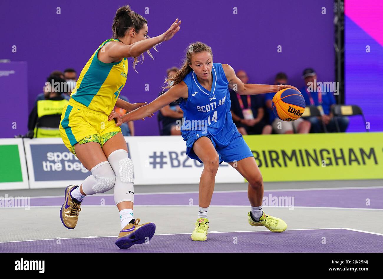 Scotland's Kennedy Leonard drives past Australia's Alex Wilson during ...